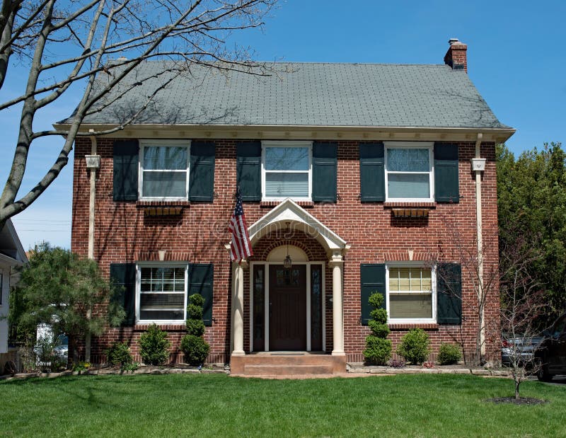 American Red Brick House in Springtime Stock Photo - Image of house ...