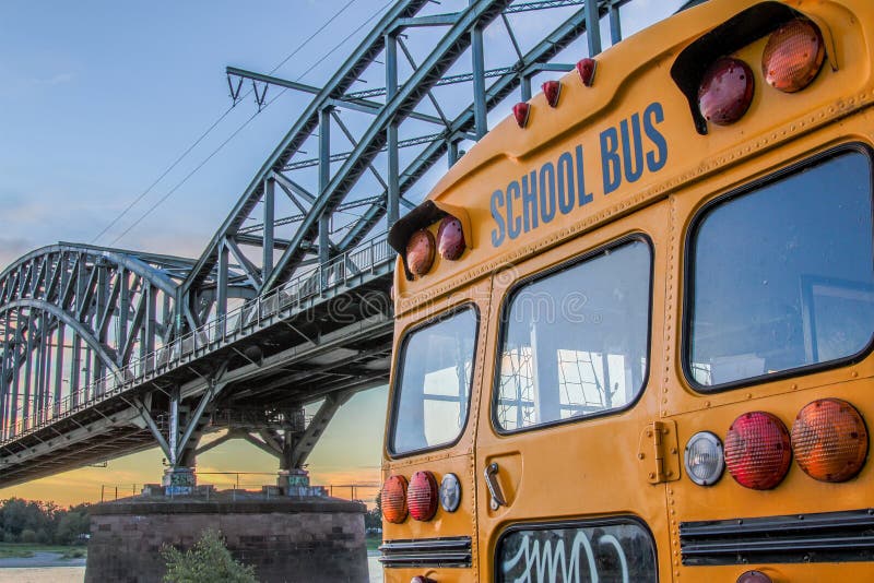 American School Bus in Front of a German Bridge Stock Image - Image of ...