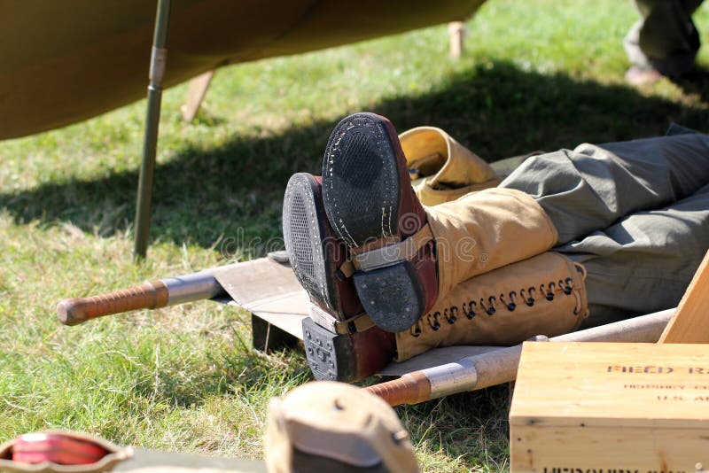American Soldier at rest stock image. Image of litter - 59449257