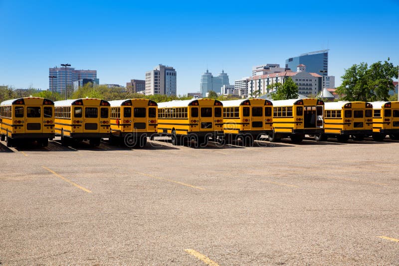 American Typical School Buses Row in a Park Outdoor Stock Image - Image ...