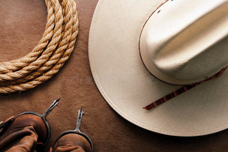 American West Rodeo Cowboy Hat with Spurs and Rope Stock Image - Image ...