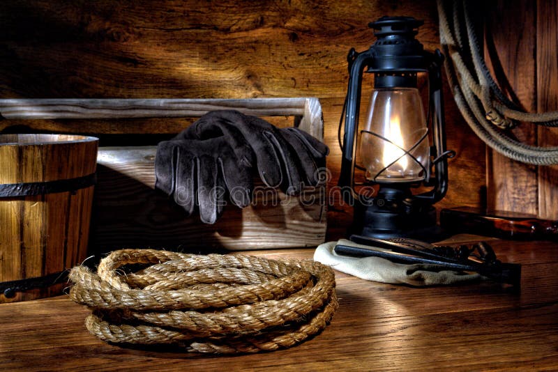 American West Rodeo Cowboy Hat in Old Western Barn Stock Image - Image ...