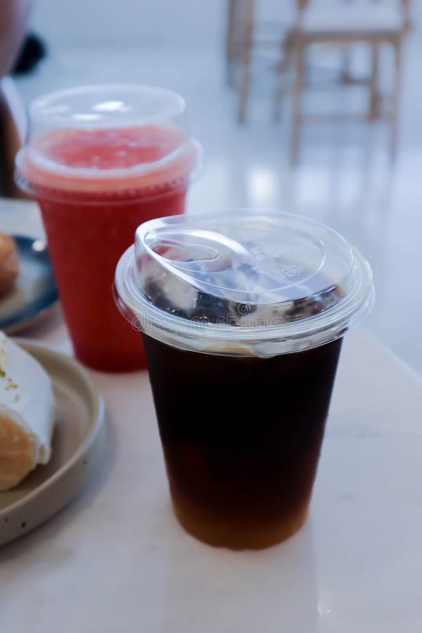 Americano Coffee or Iced Americano and Strawberry Smoothie Stock Image ...