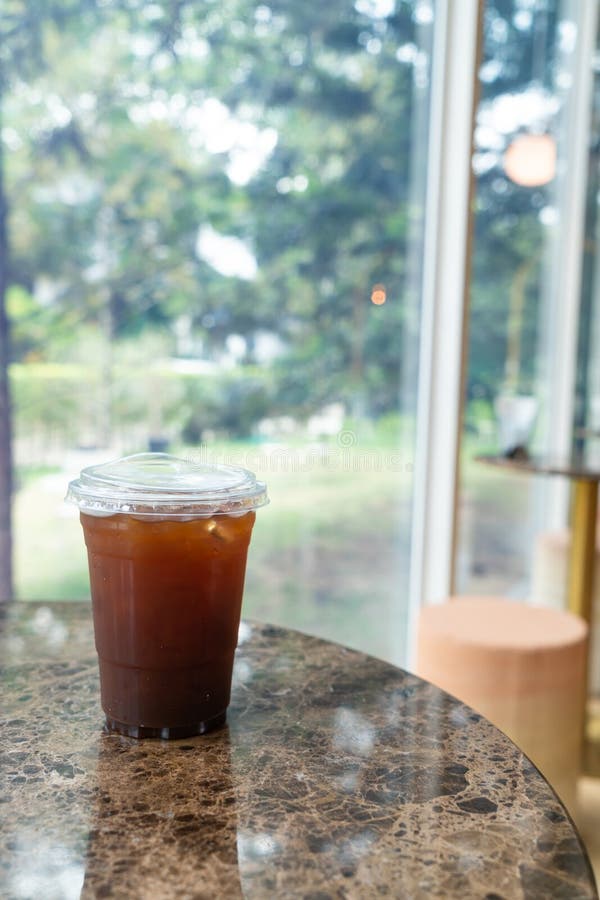 Americano Coffee on Table in Coffee Shop Stock Photo - Image of iced ...