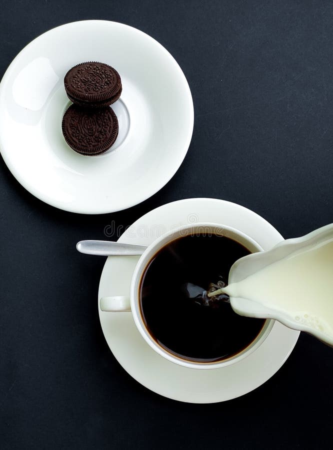 Americano with Milk and Oreo Stock Photo - Image of porcelain, latte ...