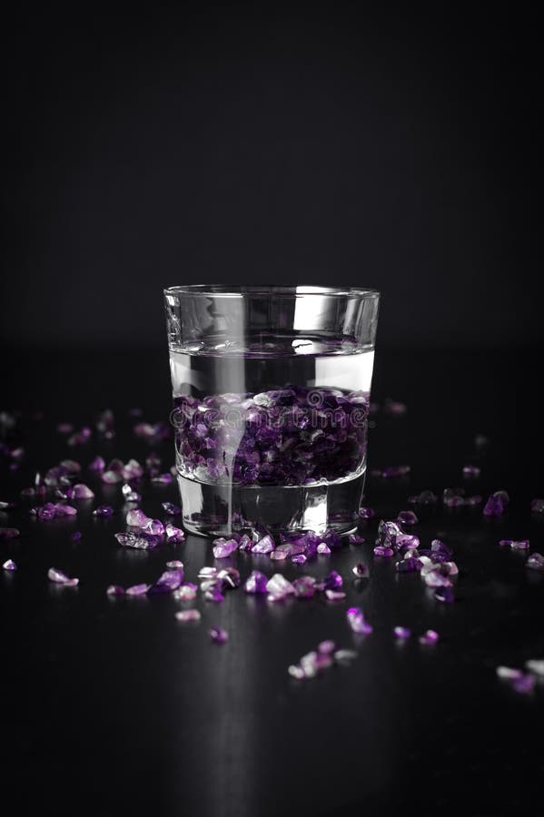 Amethyst Chips in a Glass of Water Stock Image - Image of black ...