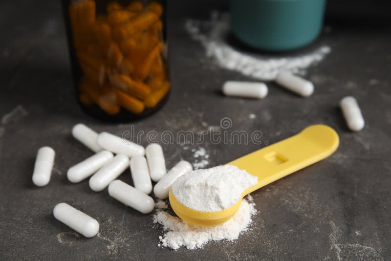Amino Acid Pills and Powder on Grey Table Stock Photo - Image of acids ...