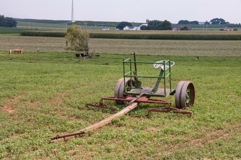Amish Farm Equipment in Field 4 Stock Image - Image of farmer, land ...