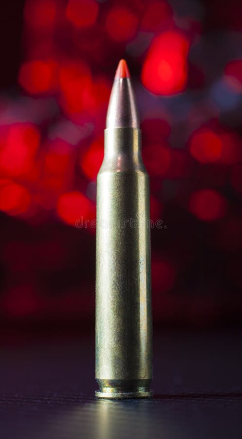 Ammo and red background stock image. Image of bullet - 103600551