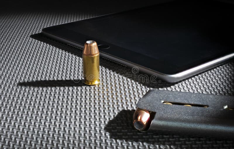 Ammo and tablet stock image. Image of computer, copper - 163732277