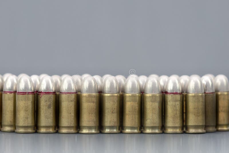 Ammunition Bullets, Grey Backround Stock Image - Image of handgun ...