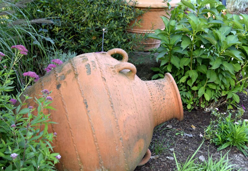 Amphora vase in the garden stock image. Image of closeup - 102115621