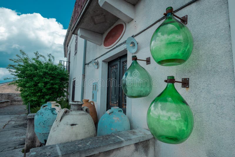 Amphoras or Ceramic and Glass Wine Containers on a Display in Mo ...