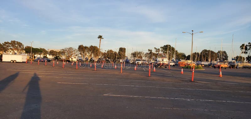 Ample Parking and Orange Elongated Cones and Cars Stock Photo - Image ...