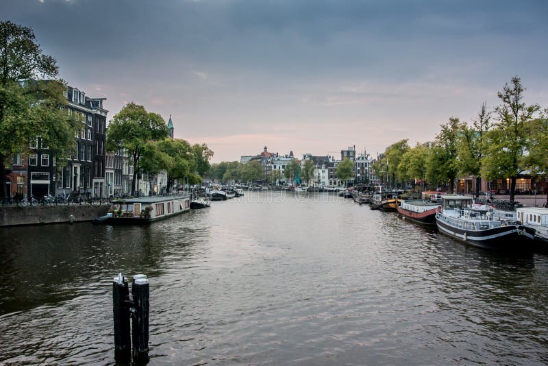 Amstel River in Amsterdam editorial stock photo. Image of amsterdam ...