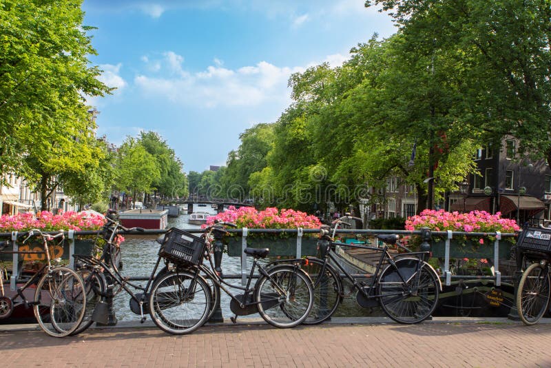 Amsterdam Canal Scene with Bicycles and Bridges Editorial Stock Photo ...