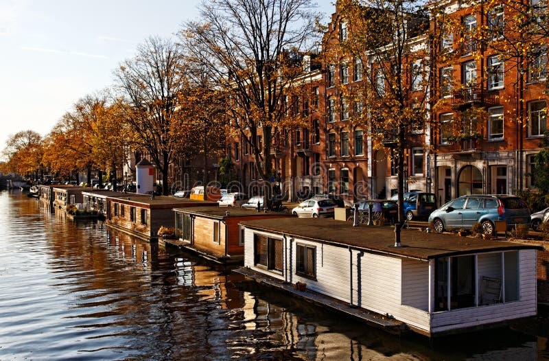Amsterdam Floating Houses in River Amstel Channel Stock Photo - Image ...