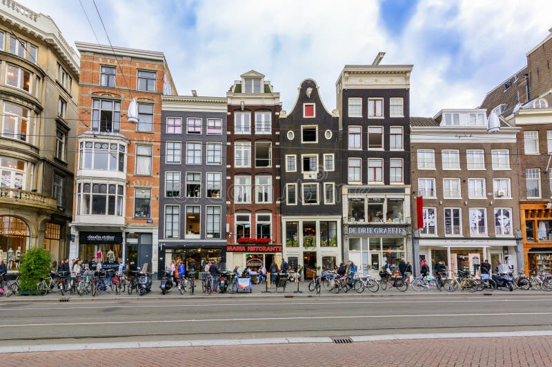 Amsterdam, Netherlands - 25 June 2018: Architecture of Damrak - Central ...