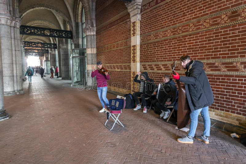 Group of Street Musicians Performing in Amsterdam, Netherlands ...