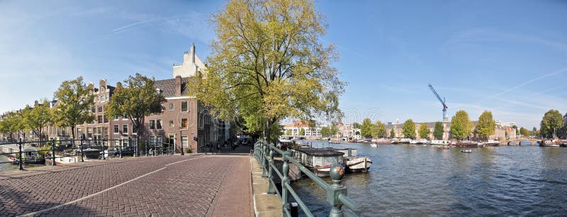 Amsterdam and the River Amstel in the Netherlands Stock Image - Image ...
