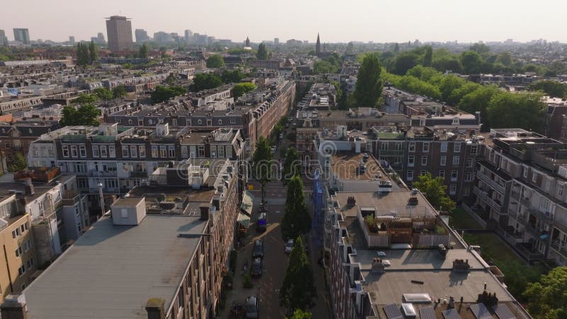 Amsterdam S Rooftops, Tree Lined Streets, and Cityscape Bathed in ...