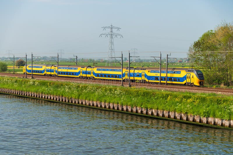 Dutch Railway Train Alongside the Amsterdam-Rhine Canal Editorial Image ...
