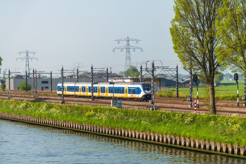 Dutch Railway Train Alongside the Amsterdam-Rhine Canal Editorial Stock ...