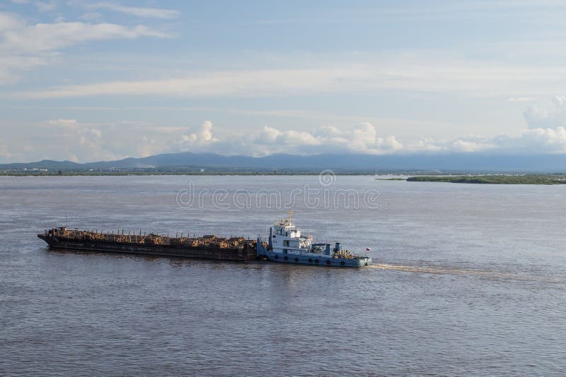 On Amur River, Tugboat Pushes Barge with Forest Stock Photo - Image of ...