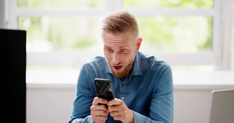 Amused Man Celebrating with Cellphone Stock Photo - Image of ecommerce ...