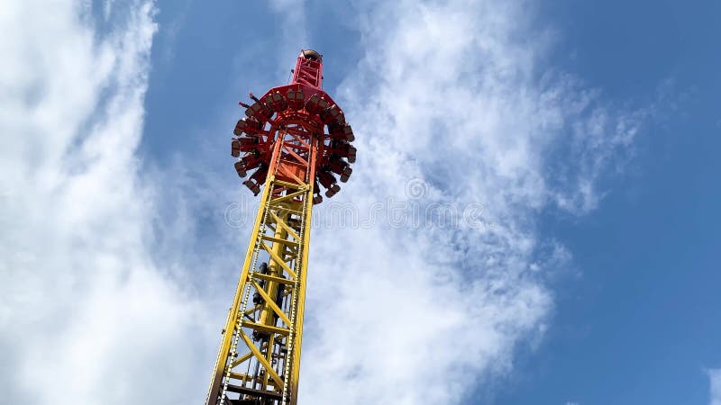 Amusement Park, Attraction with Free Fall Tower. Stock Footage - Video ...
