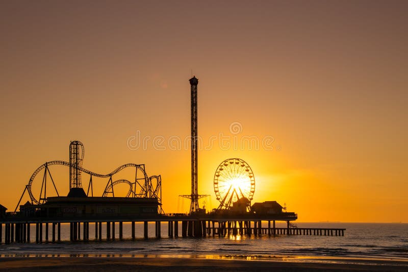 Amusement Park on the Beach at Sunset Stock Photo - Image of adventure ...