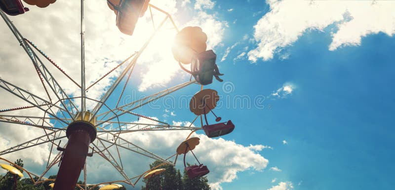 Amusement Park Carousel Against Blue Sky Stock Photo - Image of ...