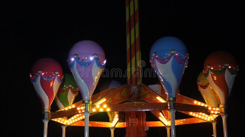 Night Carousel with Bright Colorful Lights in Amusement Park at Night ...