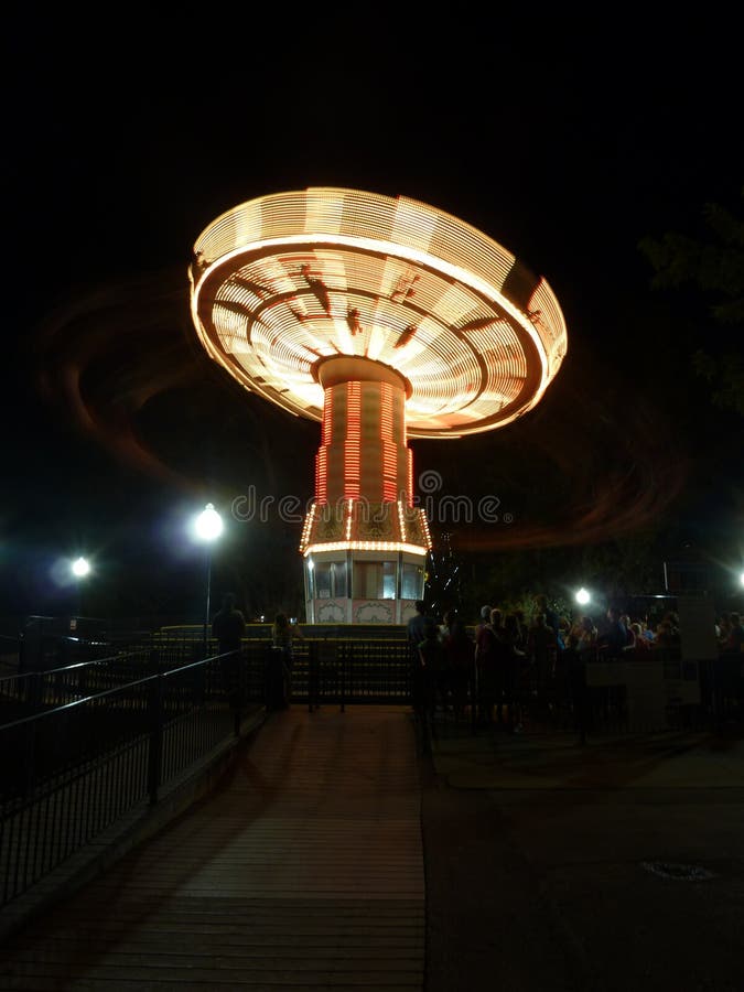 Long Exposure of an Amusement Park Ride at Night Stock Image - Image of ...