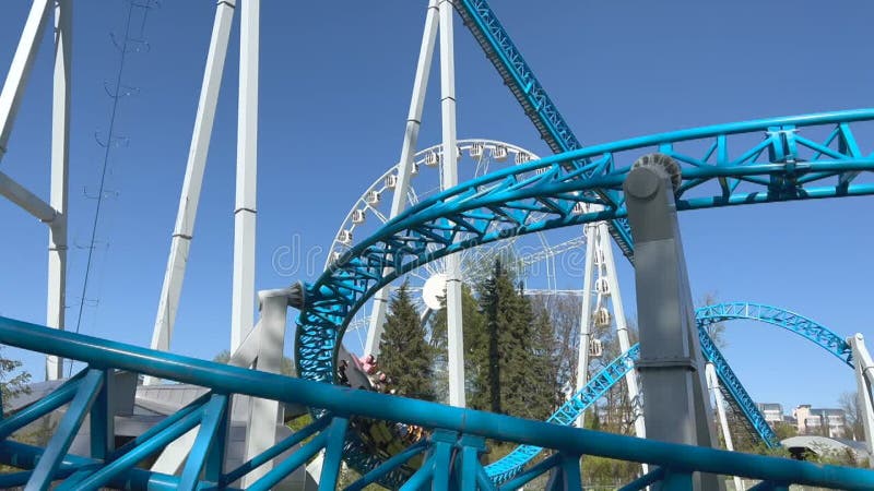 Amusement Park with Roller Coaster and Scary Rocket Ride Stock Video ...