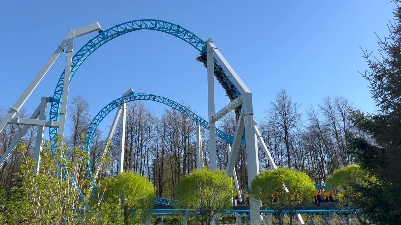 Amusement Park with Roller Coaster and Scary Rocket Ride Stock Video ...