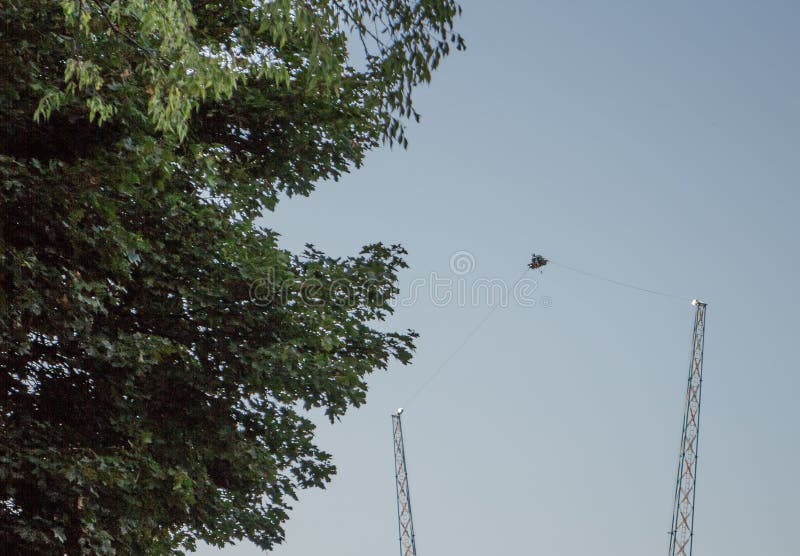 Amusement park, slingshot editorial photo. Image of fairground - 98700276