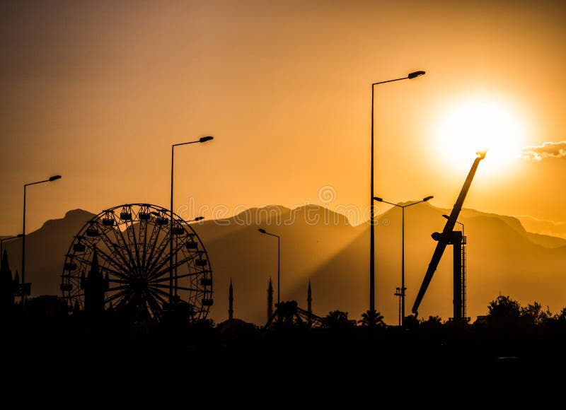 Amusement park at sunset stock photo. Image of park, light - 78433404