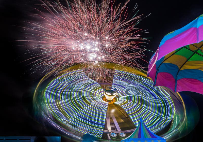 Amusement Ride and Fireworks Stock Photo - Image of fair, blue: 57848854