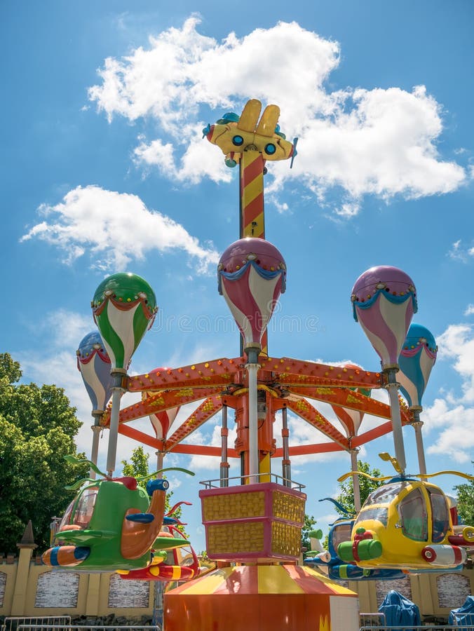 Amusement Ride in a Fun Park Against Blue Sky Stock Photo - Image of ...