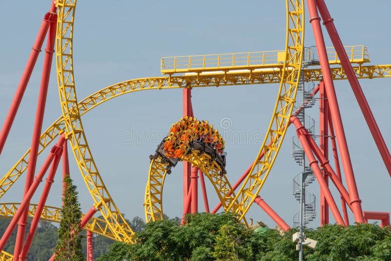 Amusement Trolley Makes Circle Loop Turns Rides in a Spiral, Red Yellow ...