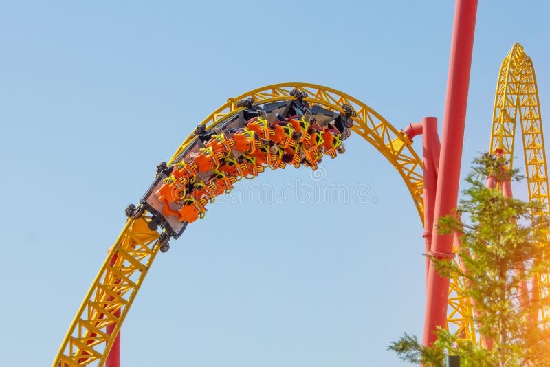 Amusement Trolley Makes Circle Loop Turns Rides in a Spiral, Red Yellow ...
