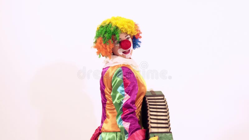 Amusing Funny Clown Playing the Harmonica, Singing and Dancing at the ...