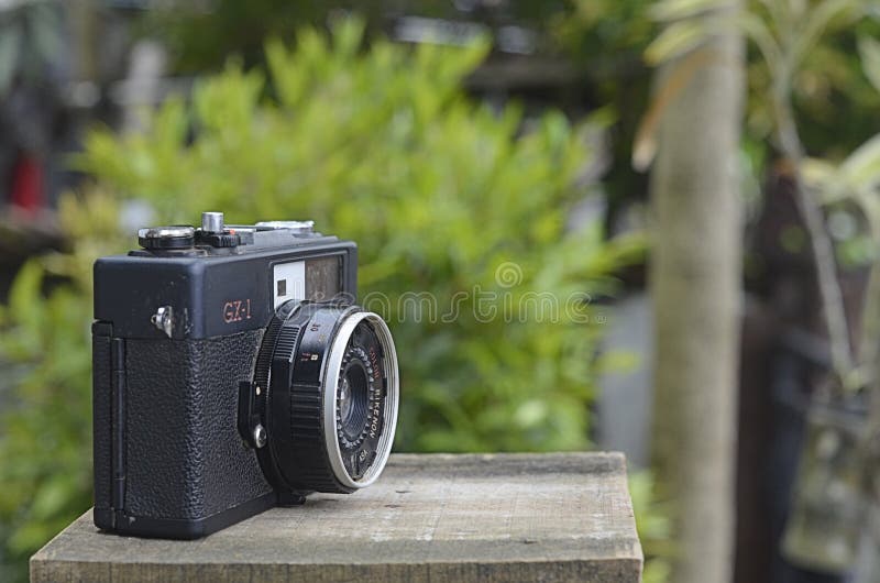 Analog Camera Placed on a Board Stock Image - Image of isolated, color ...