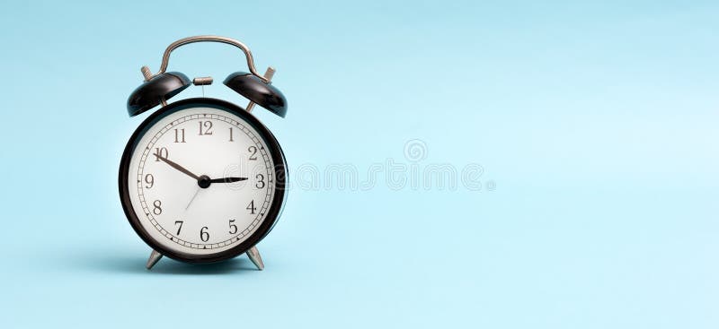Analog Clock on Blue Background Stock Photo - Image of analog, alarm ...