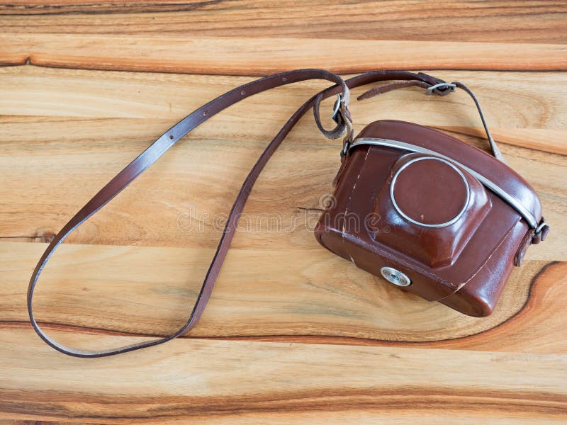 Analog Film Camera on Wooden Table Stock Photo - Image of retro, glass ...