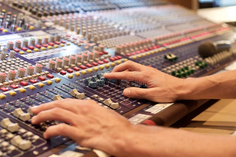 An analog soundboard stock image. Image of business, hands - 99179181