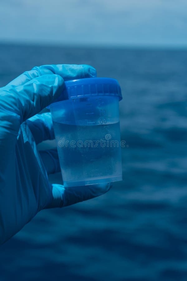Analysis of a Sample of Sea Water, Ocean. Stock Image - Image of glove ...