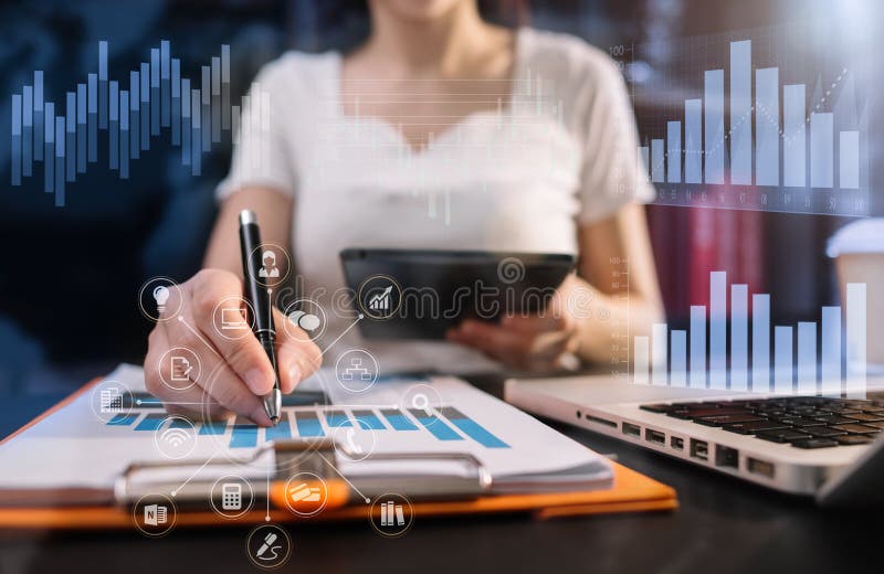 Analysis Using Tablet with Laptop and Document on Desk at Modern Office ...