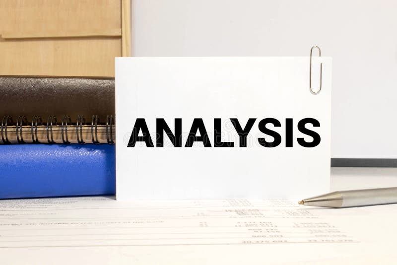 ANALYSIS Word on White Table through Craft Brown Torn Paper, Flatlay ...